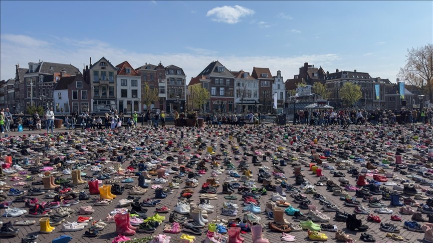 Thousands of Shoes Placed in Dutch Square to Honor Children Killed in ...